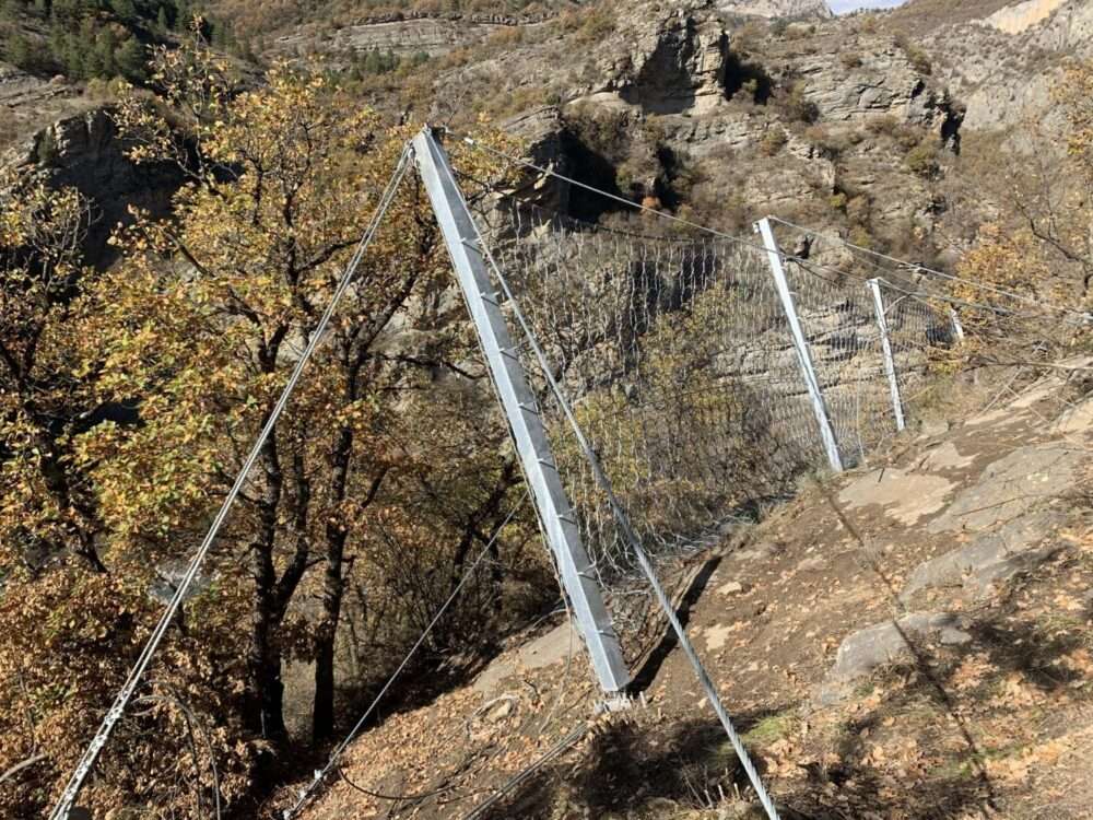 Design Considerations for Rockfall Barriers on Steep Slopes - Evergreen Enterprises