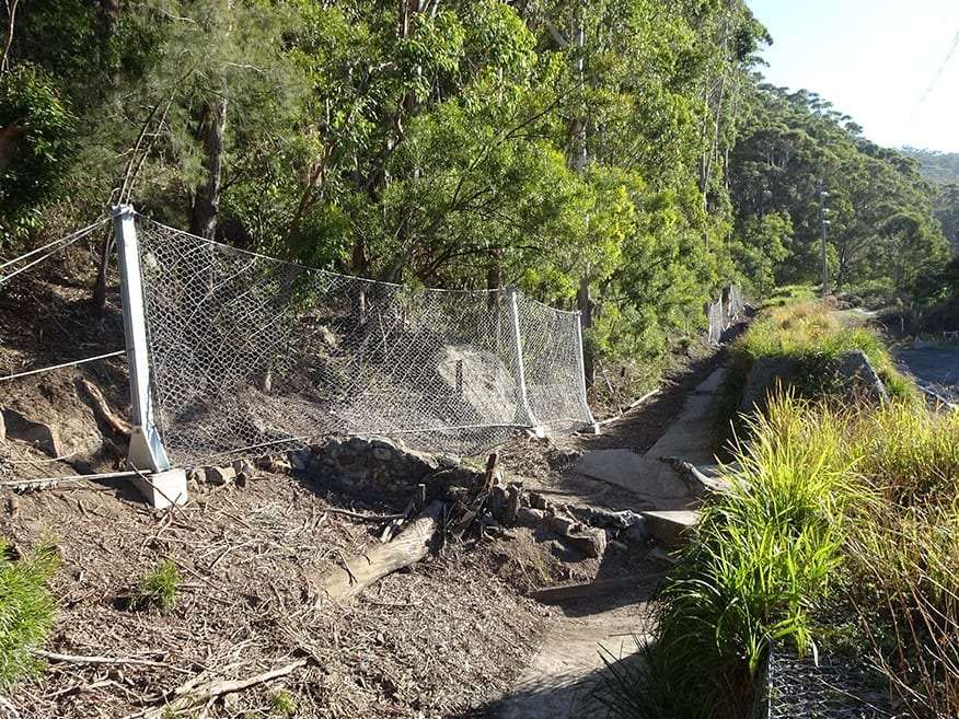 Economic and Environmental Benefits of Rockfall Barriers in Slope ...